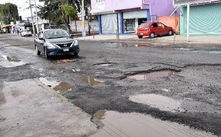 En tiempo de lluvias ¡Cuidado con los baches! | Tus Buenas Noticias